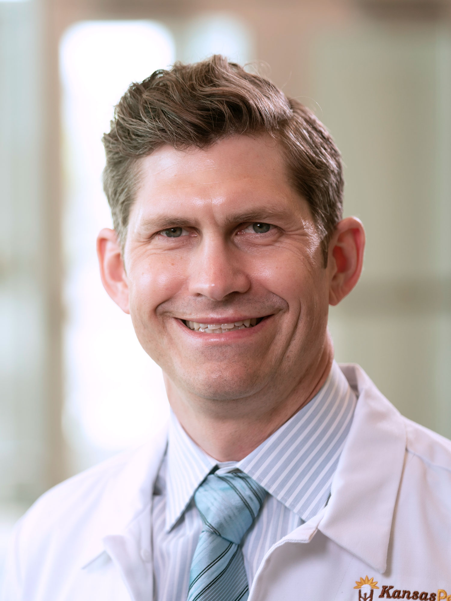 About Our Doctors and Dental Services - Kansas Perio